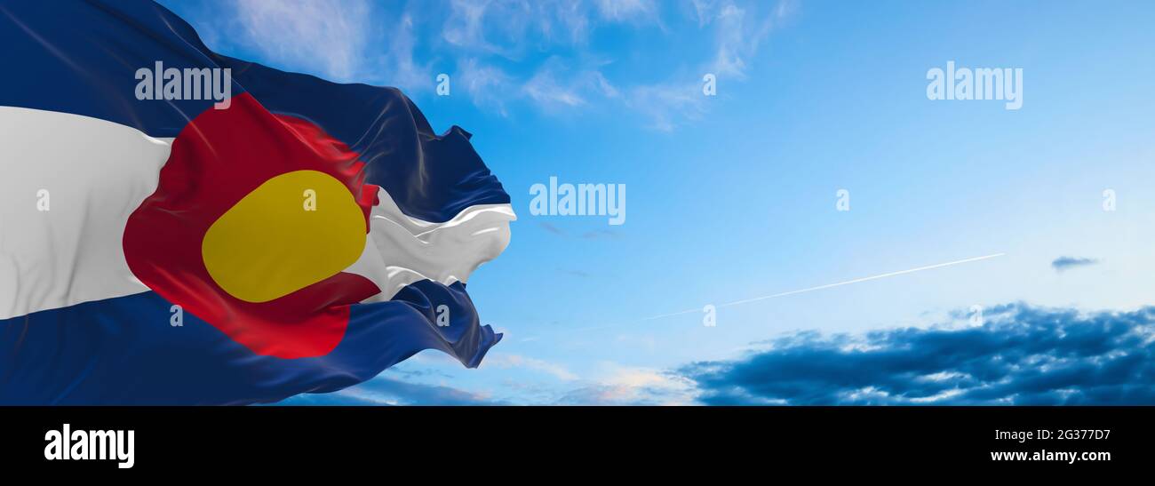 flag of Colorado at cloudy sky background on sunset. Patriotic concept ...