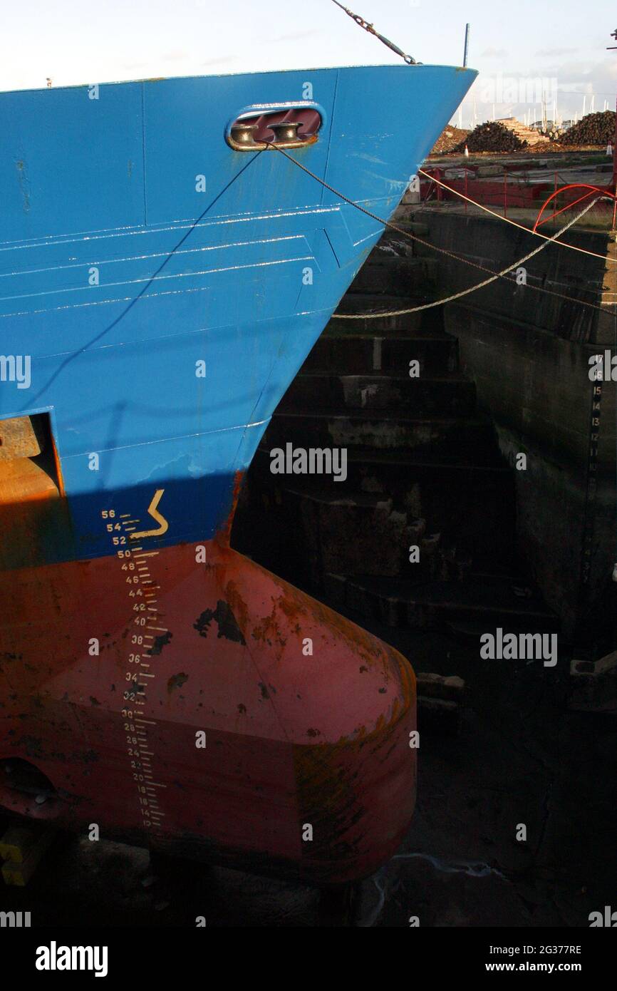 Port of Troon., Ayrshire, Scotland, UK. A ship in drydock undergoes ...