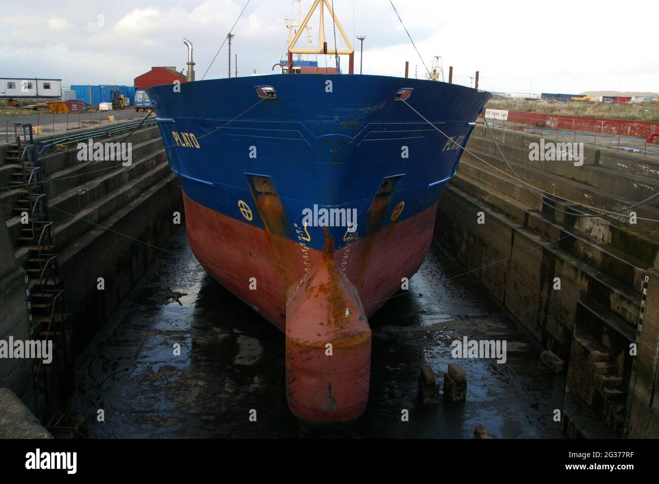 Port of Troon., Ayrshire, Scotland, UK. A ship in drydock undergoes ...