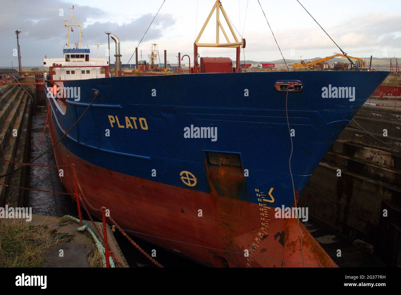 Port of Troon., Ayrshire, Scotland, UK. A ship in drydock undergoes ...