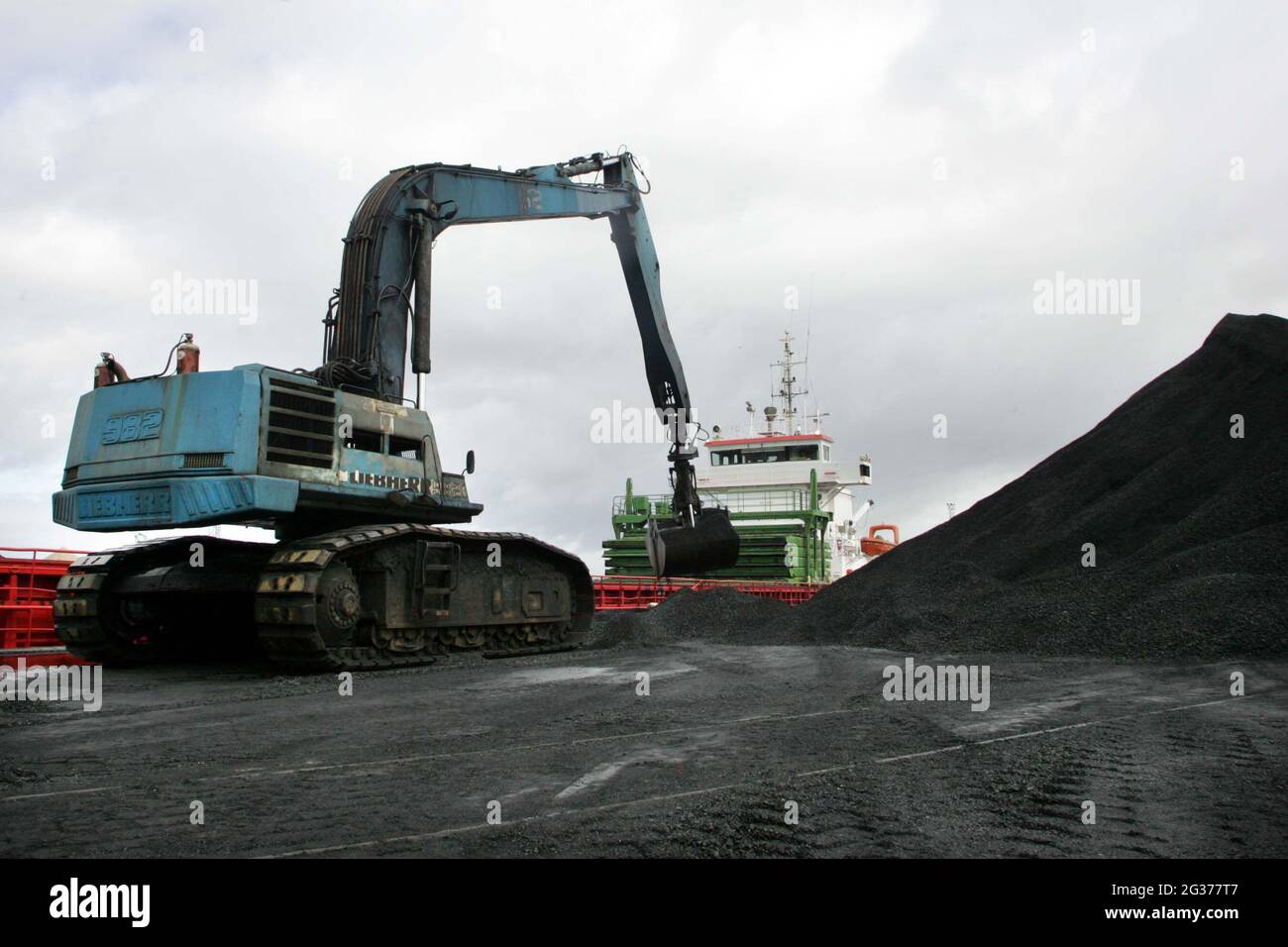Port of Ayr Harbour, Ayrshire, Scotland, UK . Ship being loaded with ...