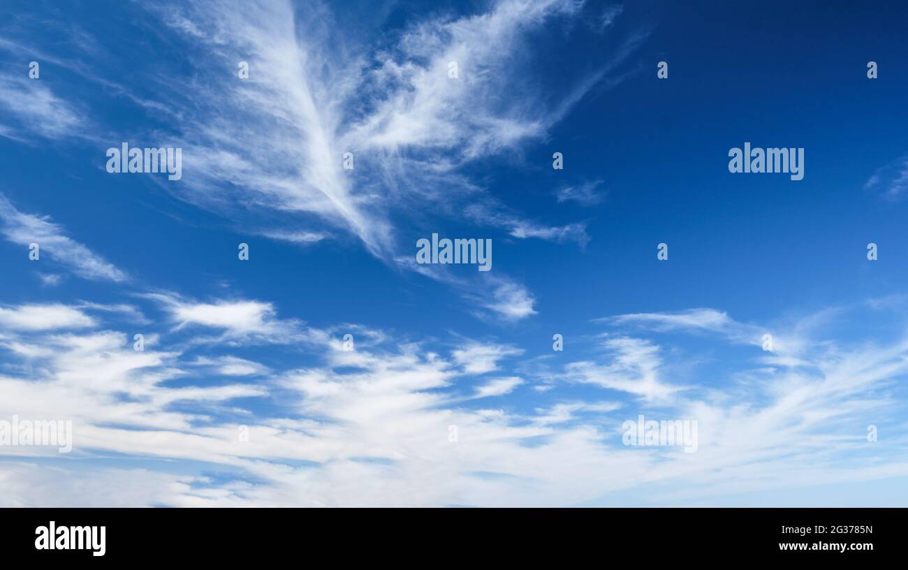 Blue clear sky with clouds Stock Photo - Alamy