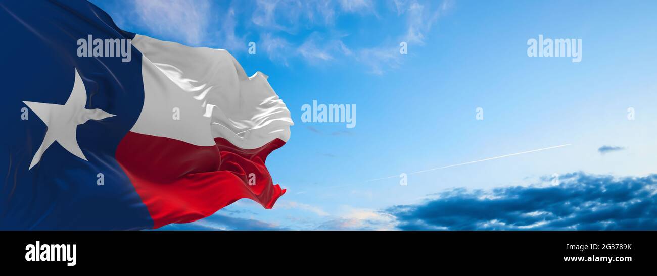 flag of Texas at cloudy sky background on sunset. Patriotic concept ...