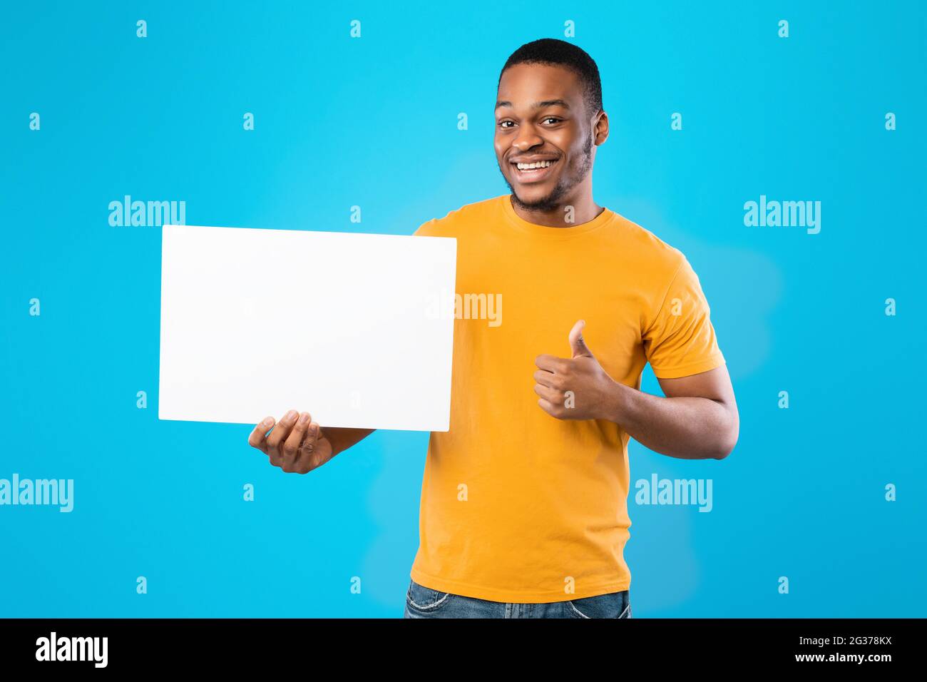 Thumbs up with board hi-res stock photography and images - Alamy