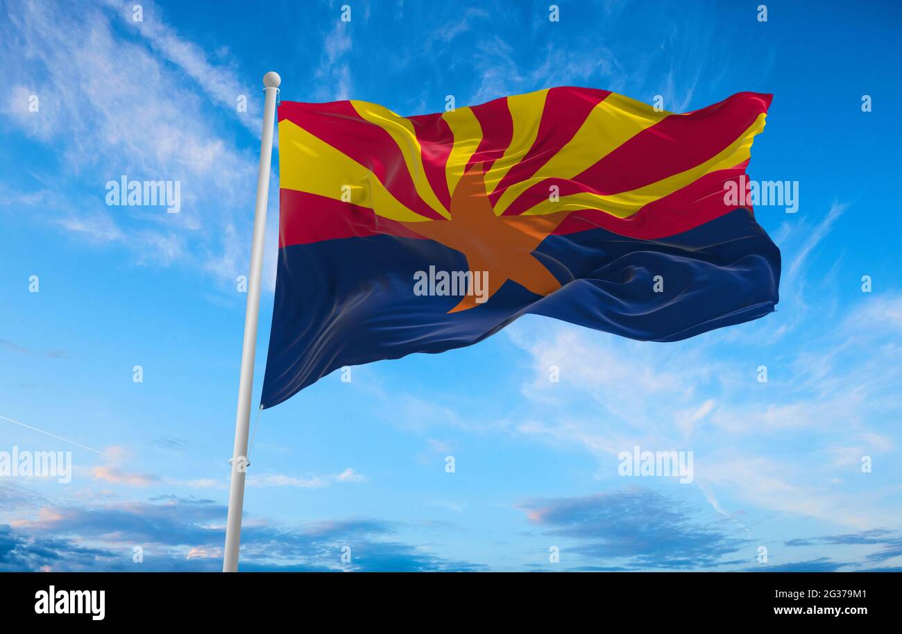 flag of Arizona at cloudy sky background on sunset. Patriotic concept ...