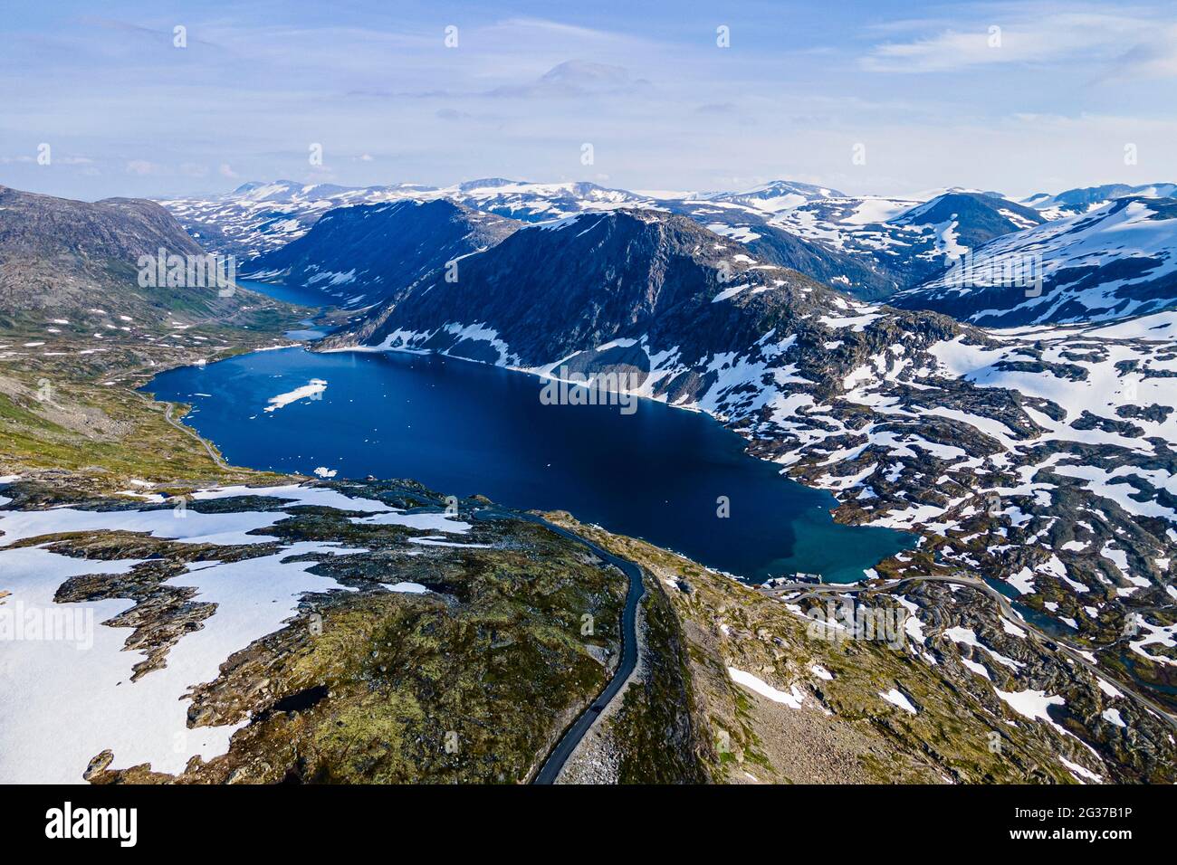 Aerial of a mountain lake in the mountains over Geirangerfjord, Sunmore ...