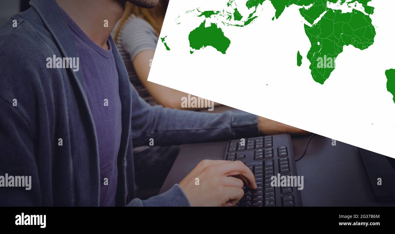 World map against mid section of people working at office Stock Photo ...