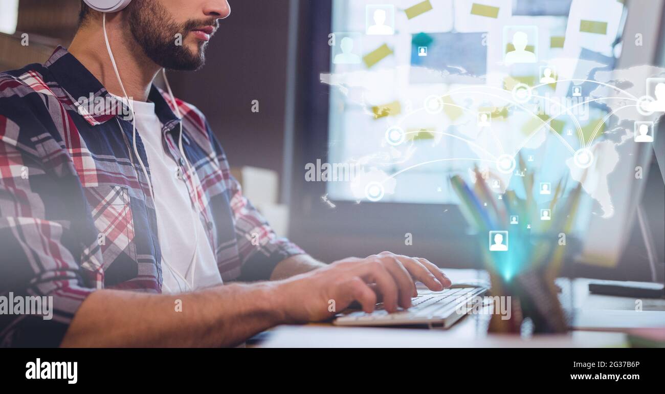 Network of connections over world map against mid section of man using ...