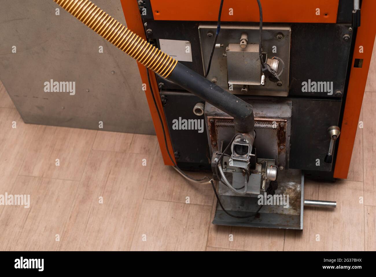 Picture of an automatic pellet burner system Stock Photo - Alamy