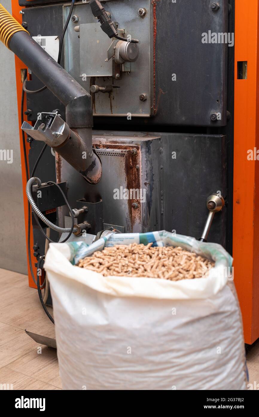 Picture of an automatic pellet burner system Stock Photo - Alamy