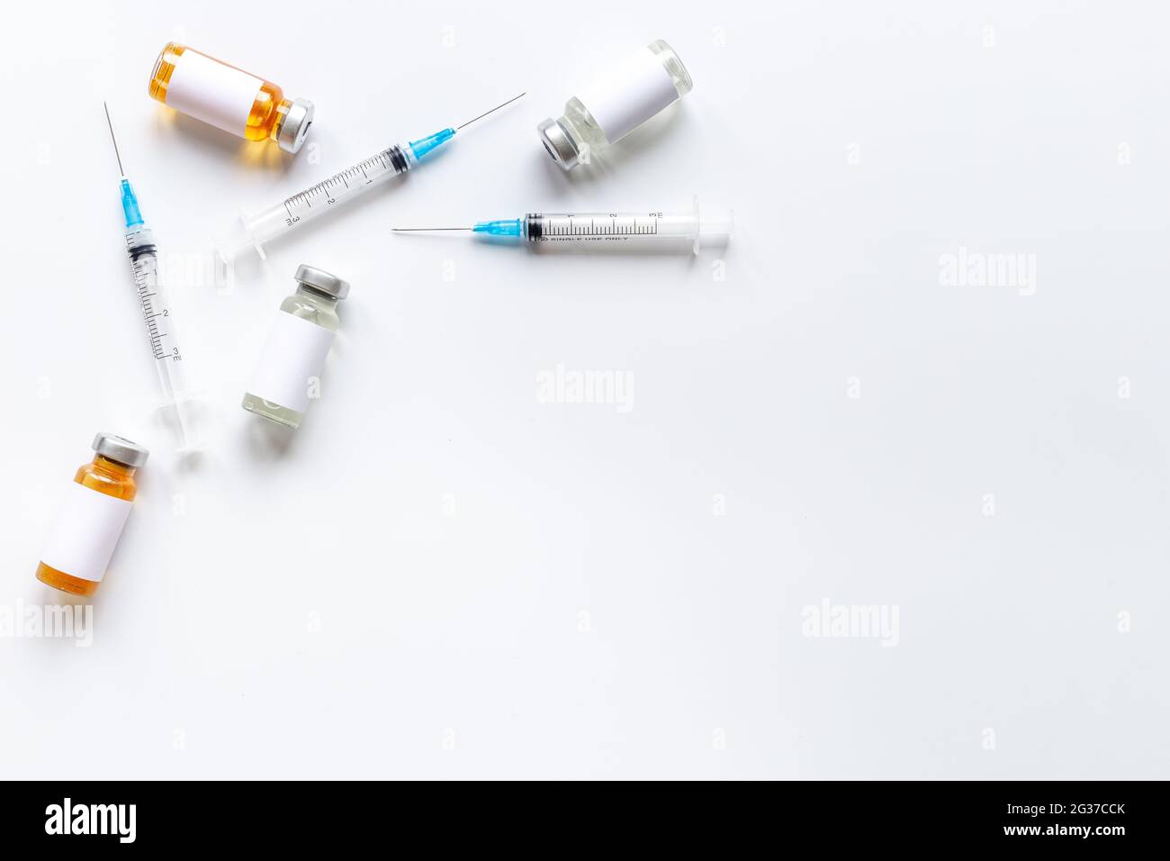 Medical vials with vaccine. Top view, copy space Stock Photo - Alamy