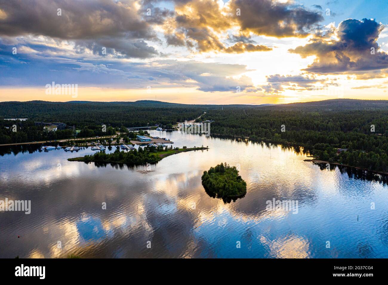 Clouds reflecting at sunset on Lake Inari, Inari, Lapland, northern ...