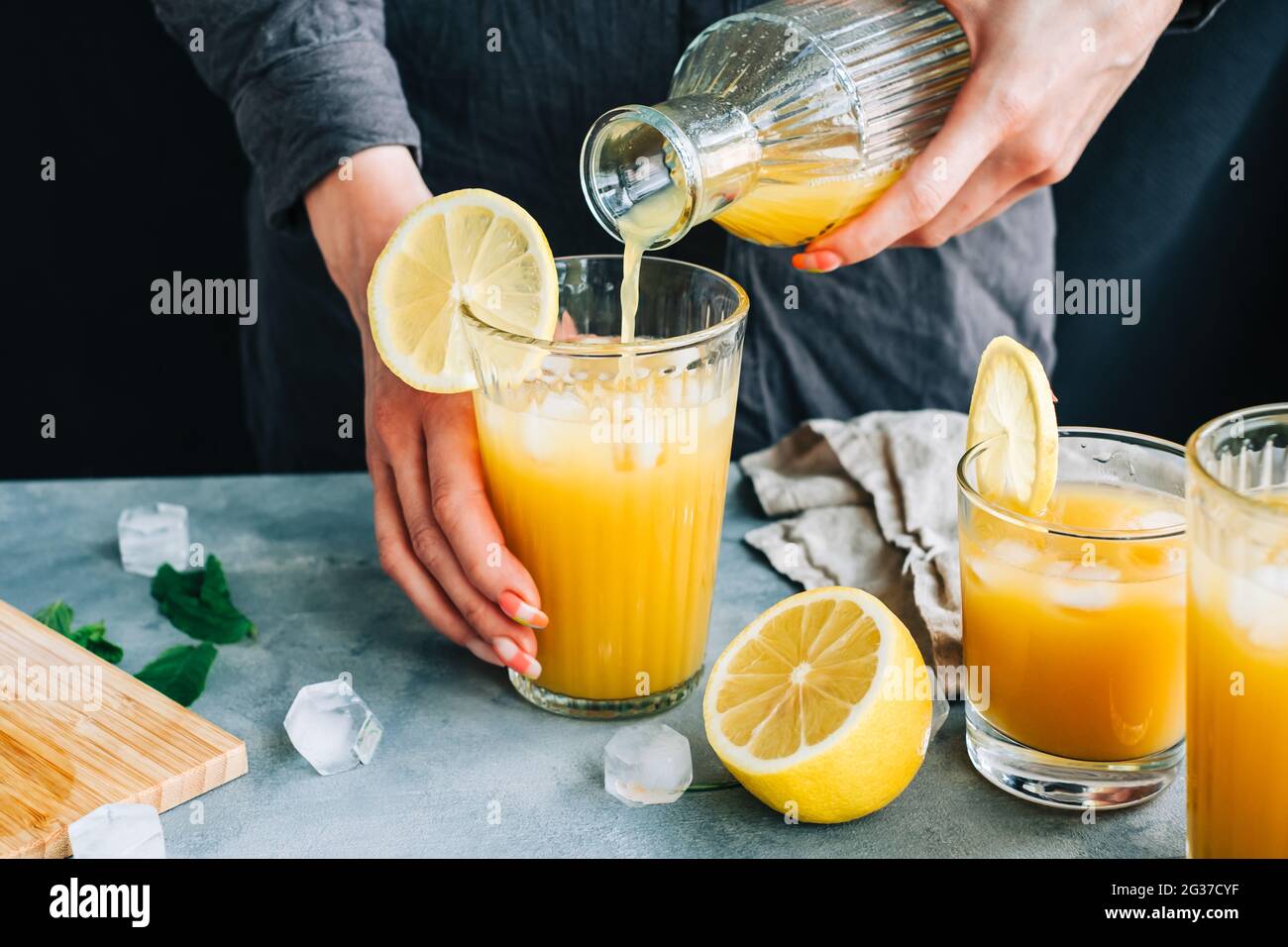Closeup lemonade preparation process making hi-res stock photography ...