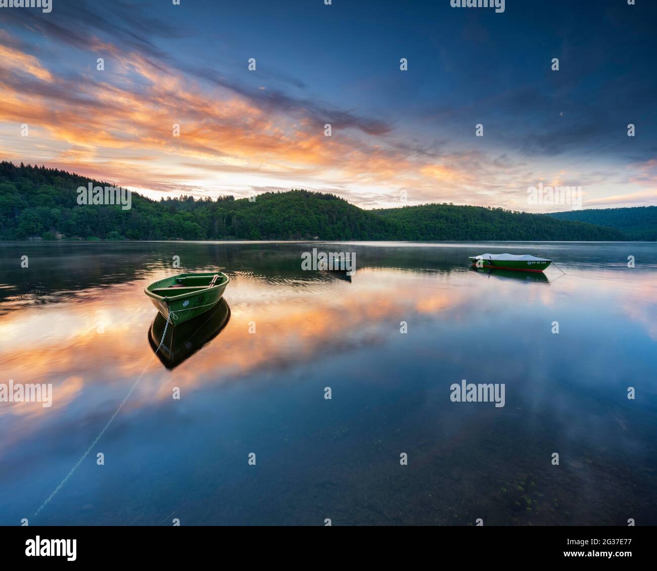 Morning glow at the Edersee, fishing boats in the water, Ederstausee ...