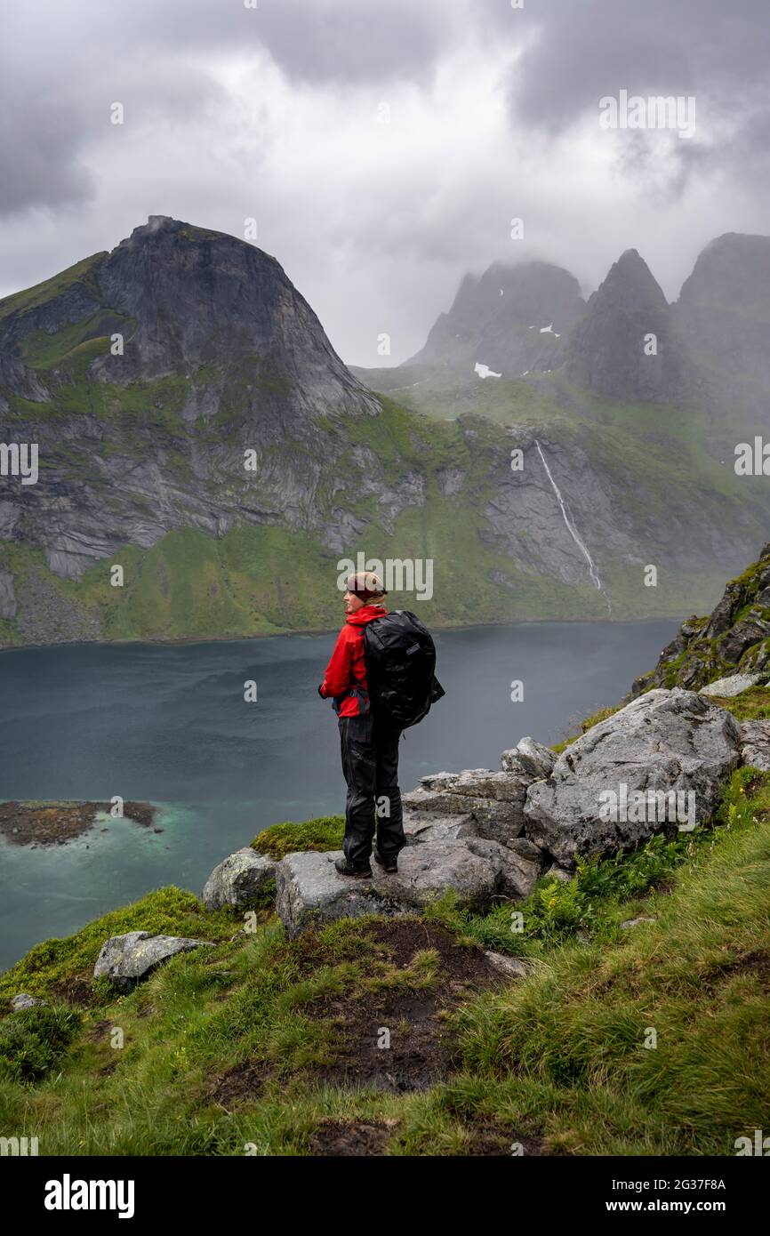 Hiking in bad weather, fjords and mountains, hiking to the mountain ...