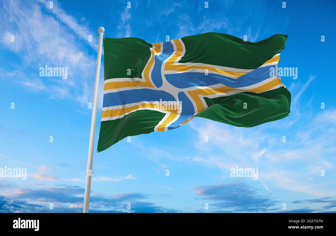 flag of Portland, Oregon at cloudy sky background on sunset, panoramic ...