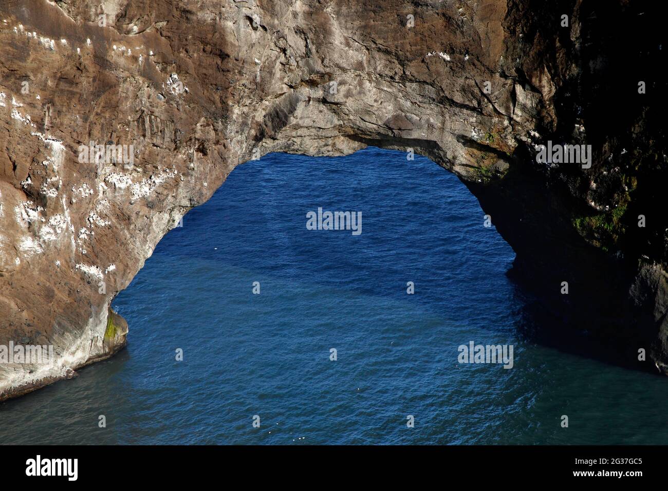 Rock gate in the Atlantic Ocean, Cape Dyrholaey, Vik, south coast ...