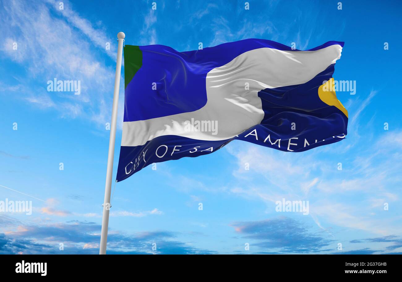 flag of Sacramento, California at cloudy sky background on sunset ...