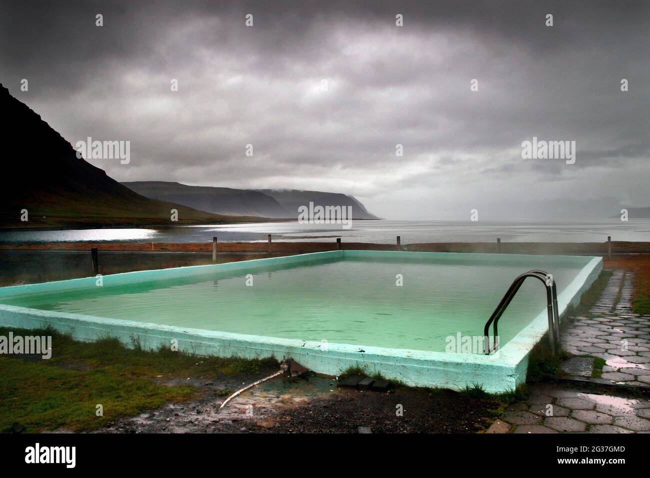 Outdoor pool by the fjord, Swimming pool, Geothermal spring ...