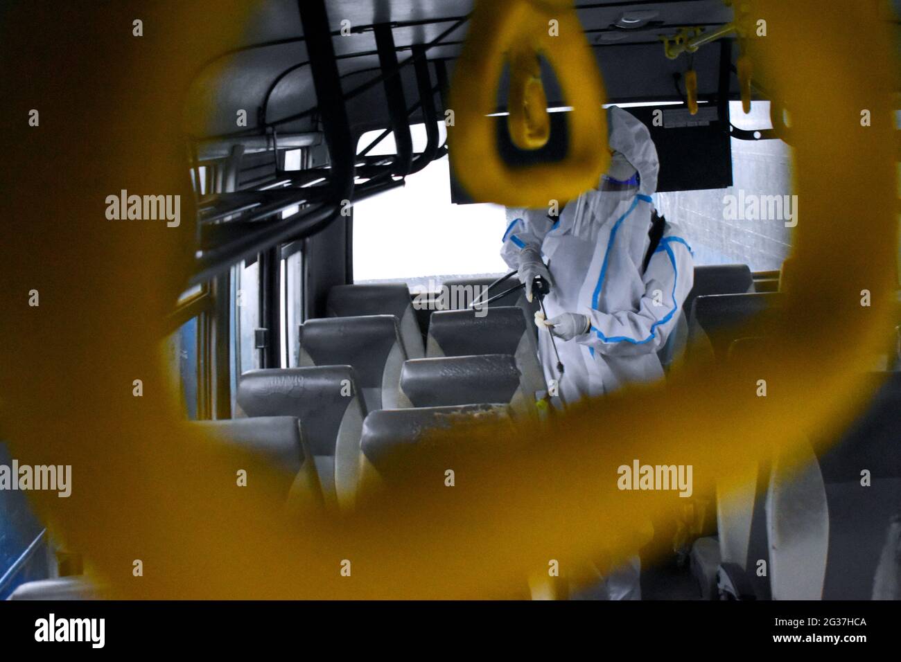 Kolkata, India. 14th June, 2021. A staff member of West Bengal ...