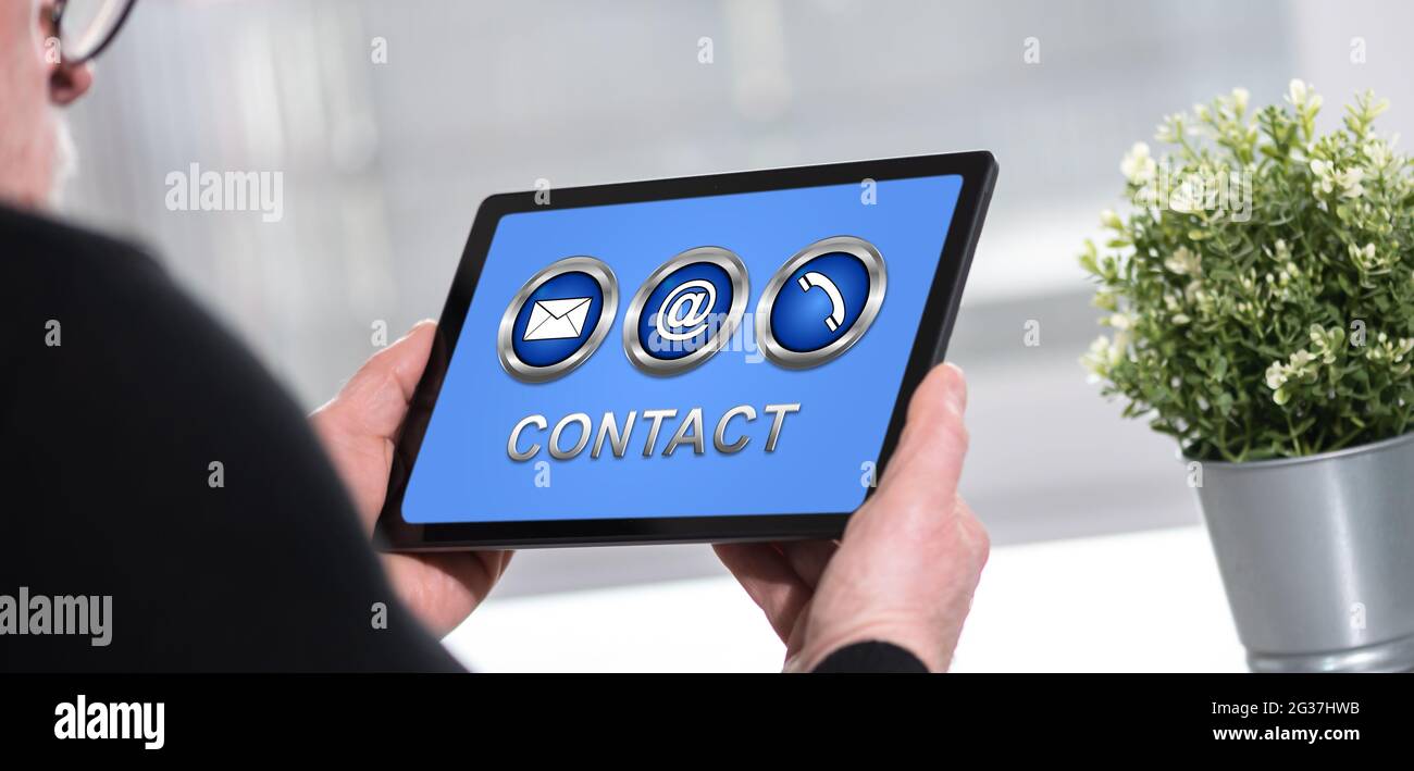 Tablet screen displaying a contact concept Stock Photo - Alamy