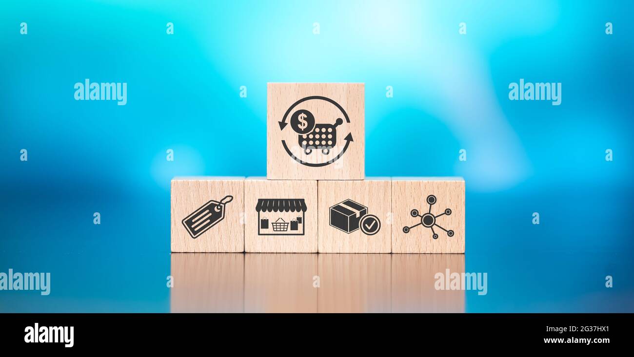 Wooden blocks with symbol of purchase concept on blue background Stock ...
