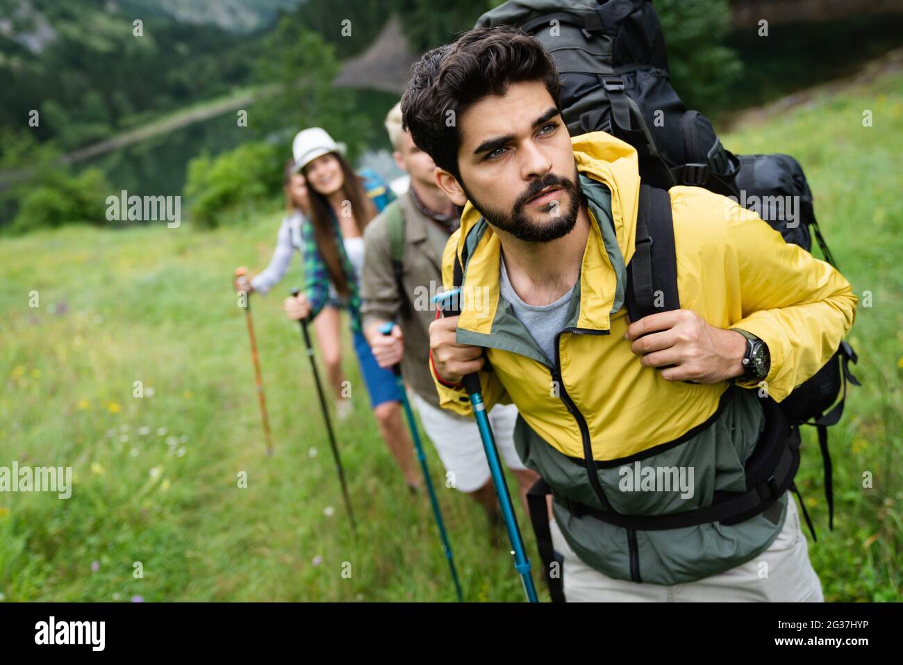 Group of happy hiker friends trekking as part of healthy lifestyle ...