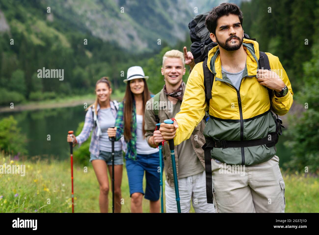 Hard, difficult, tiring and exhausting expedition of friends. Trekking ...