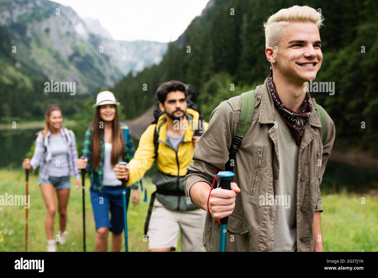 Group of happy hiker friends trekking as part of healthy lifestyle ...