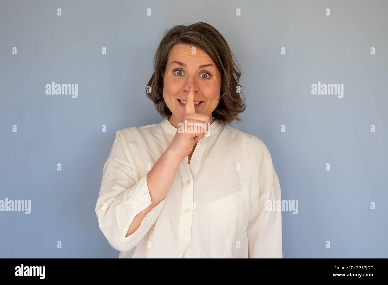 Placing Hand Over His Mouth High Resolution Stock Photography and ...