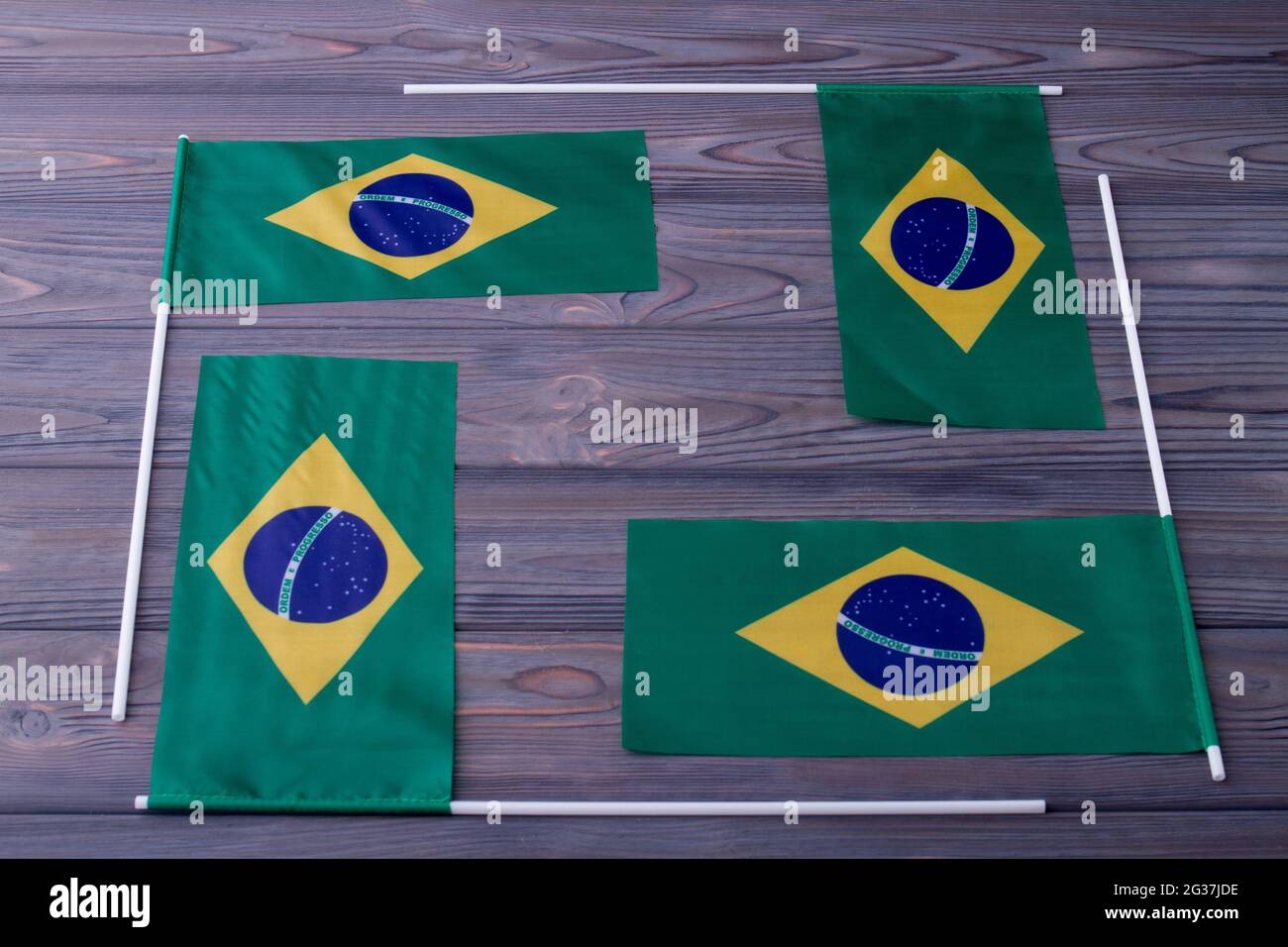Composition of four brazilian flags on grey wood background Stock Photo ...