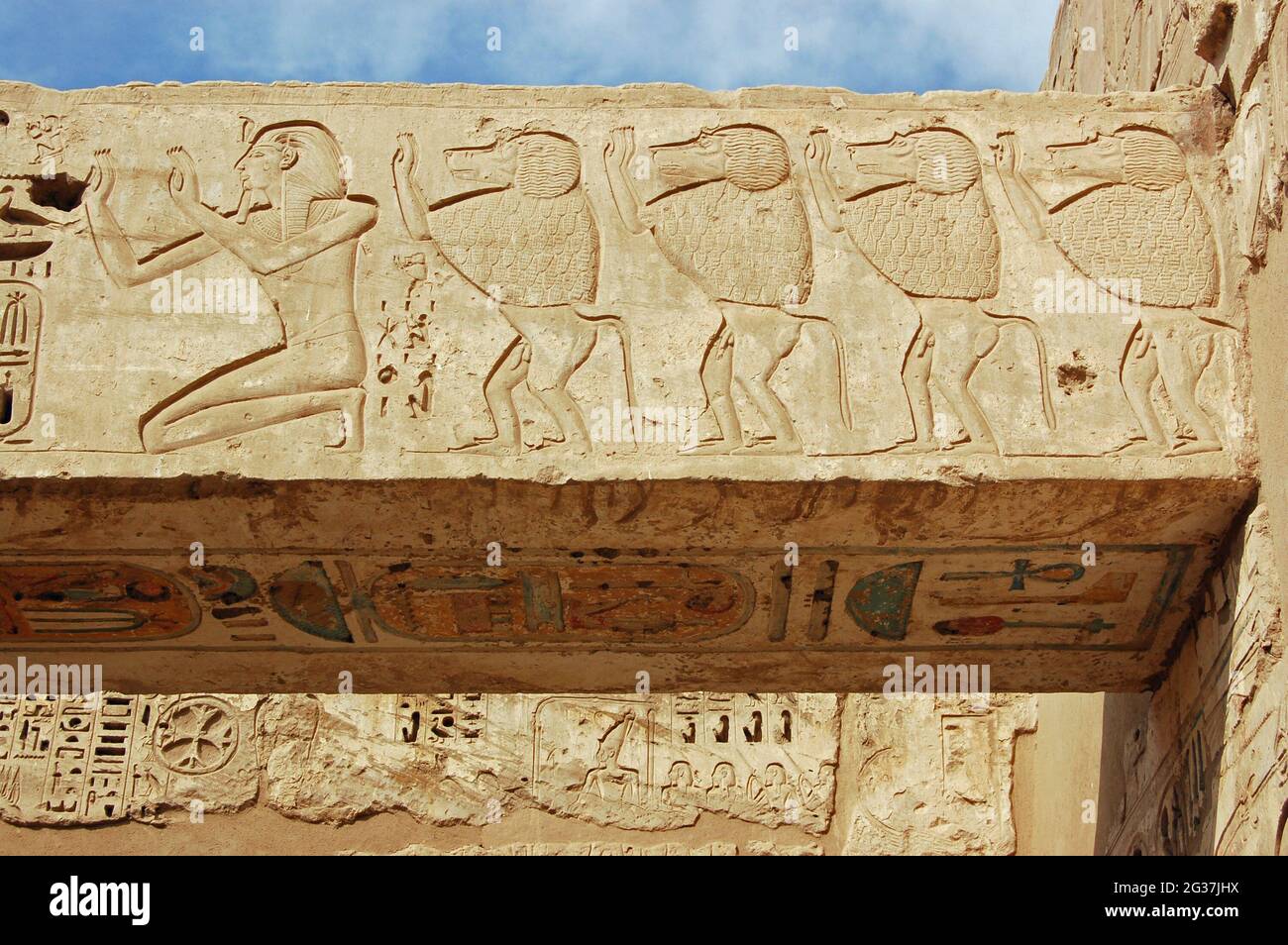 Stone lintel in the Ancient Egyptian temple of Medinet Habu carved with ...