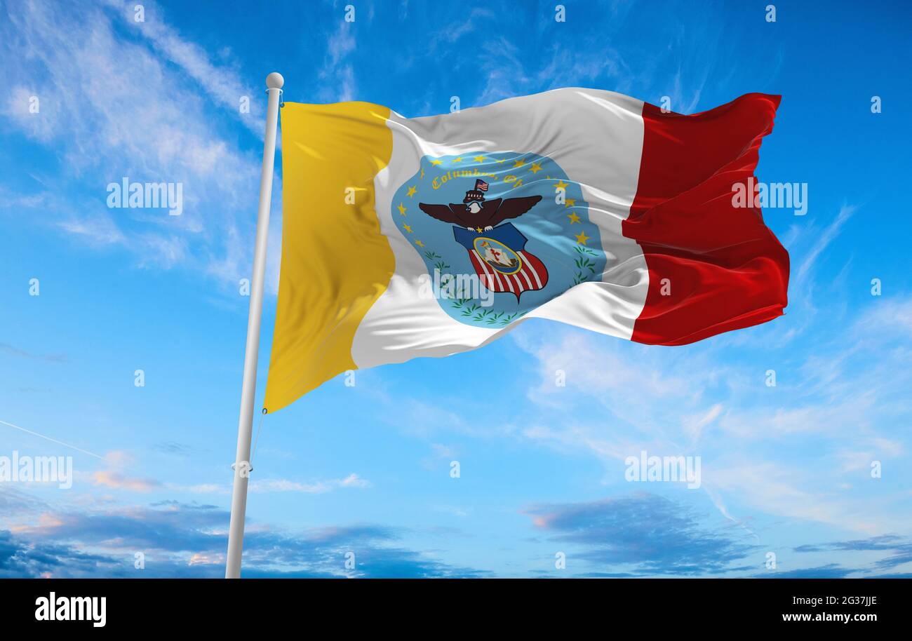 flag of Columbus at cloudy sky background on sunset, panoramic view ...