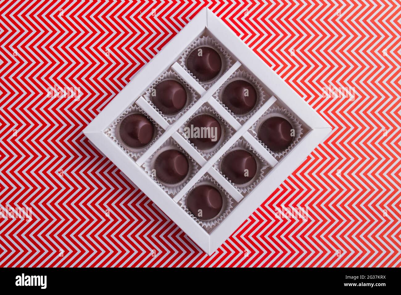 Top view chocolate box with delicious brown candies Stock Photo - Alamy