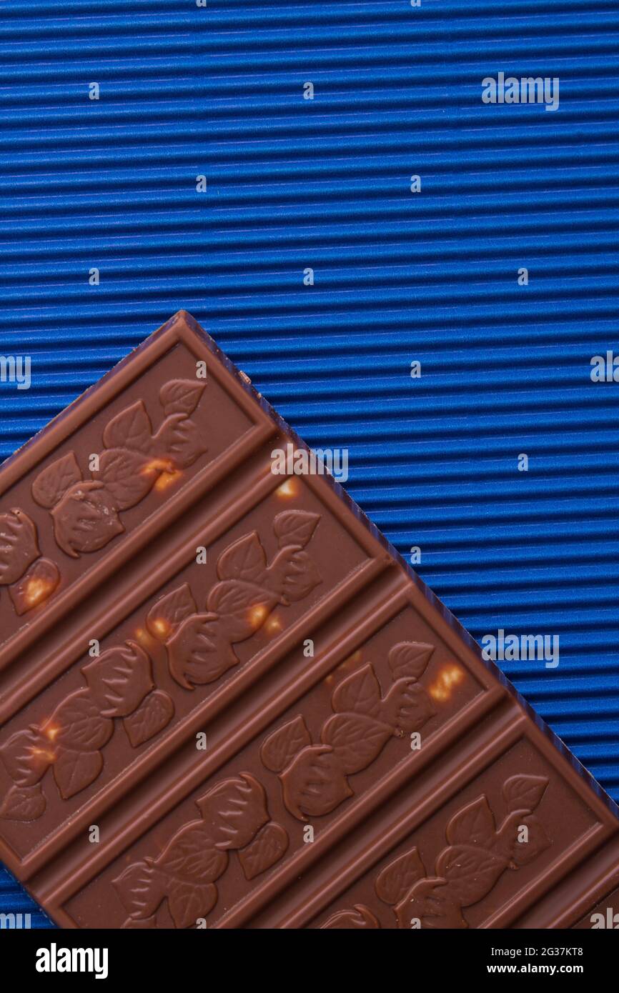 Close-up vertical shot decorative chocolate bar with hazelnuts Stock ...