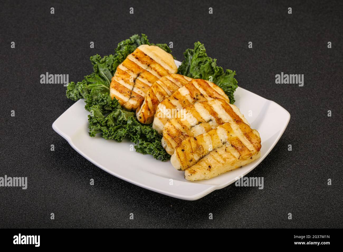 Grilled Greek haloumi cheese with herbs and spices Stock Photo - Alamy
