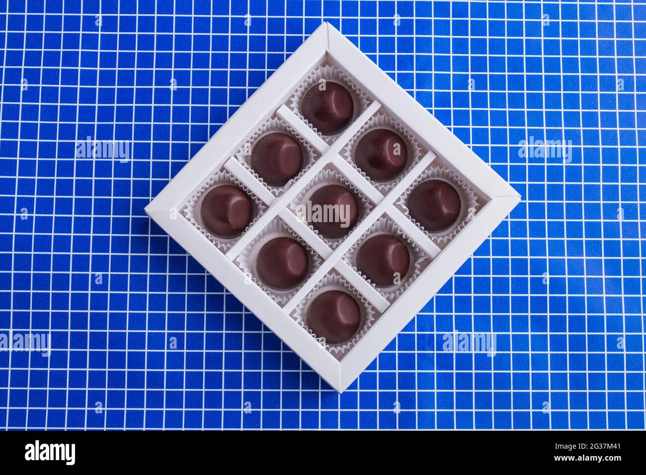 Top view chocolate box with round candies Stock Photo - Alamy