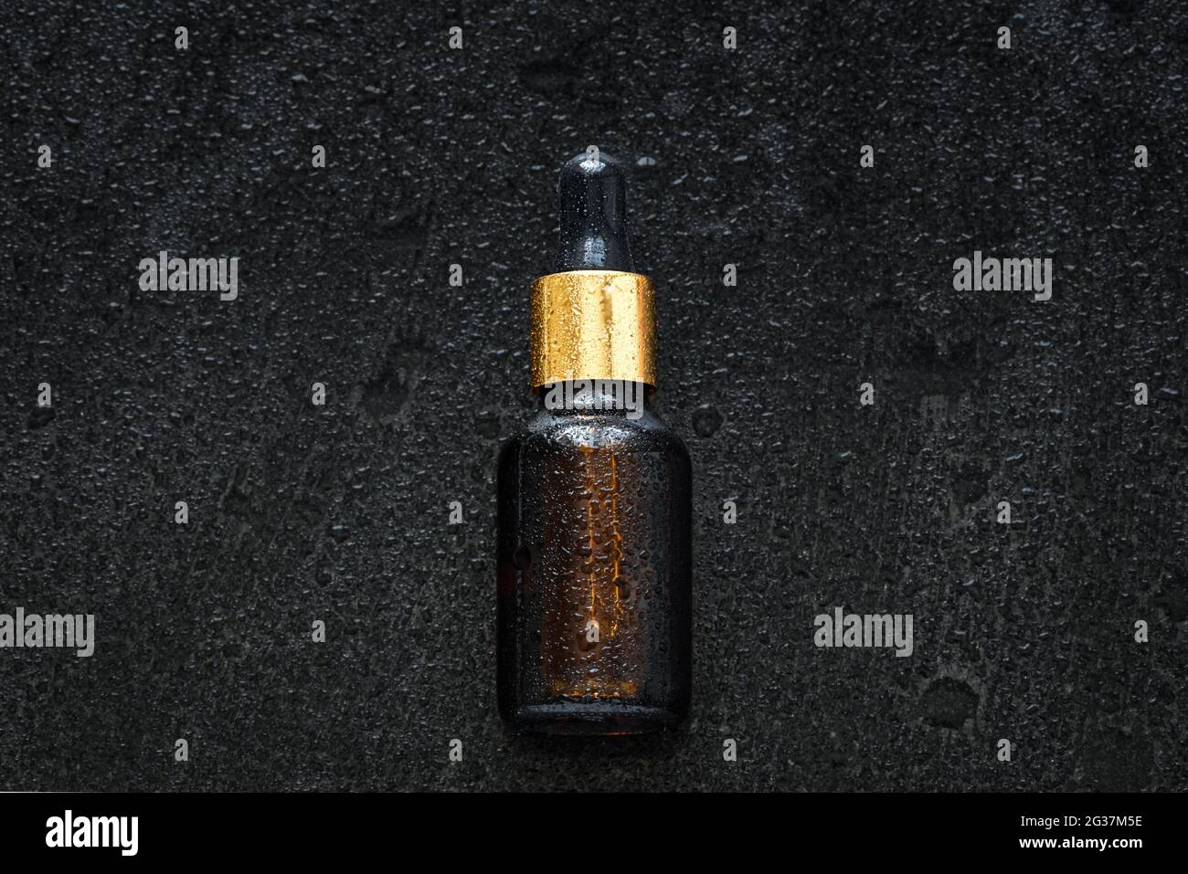 Dropper beauty product (face serum, fluid, emulsion, essential oil) on ...