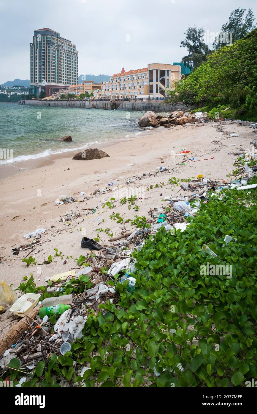 Garbage, mainly from stormwater outfall into Victoria Harbour, washed ...