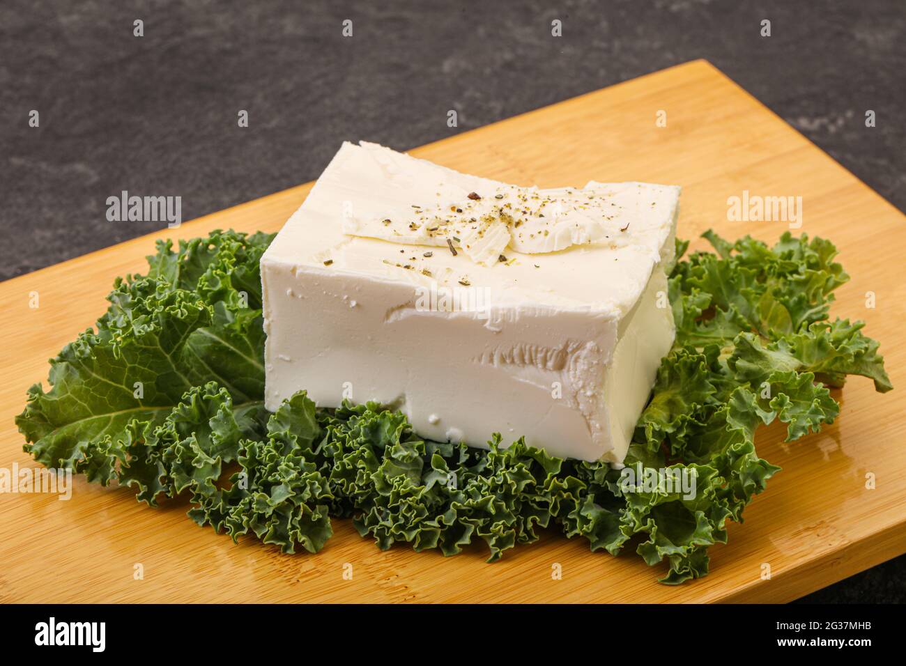 Traditional tasty Greek Feta soft cheese brick Stock Photo - Alamy