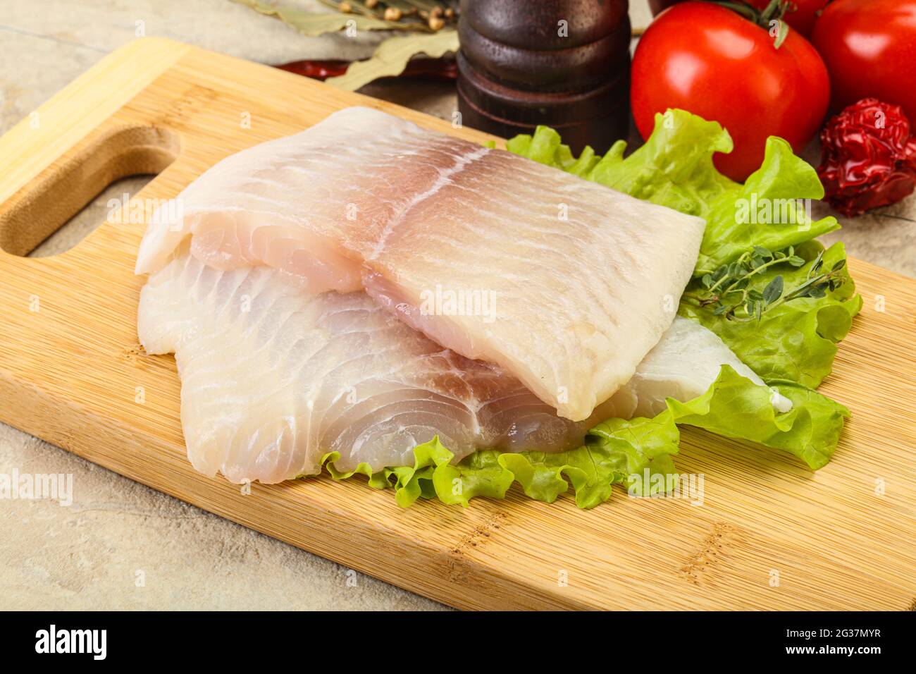 Raw pangasius fillet fish for cooking Stock Photo - Alamy