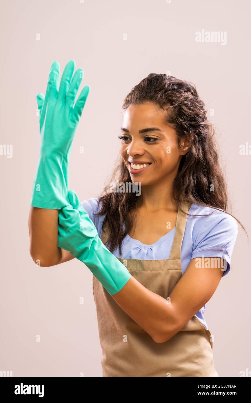 Portrait of happy and successful african-american housewife who is ...