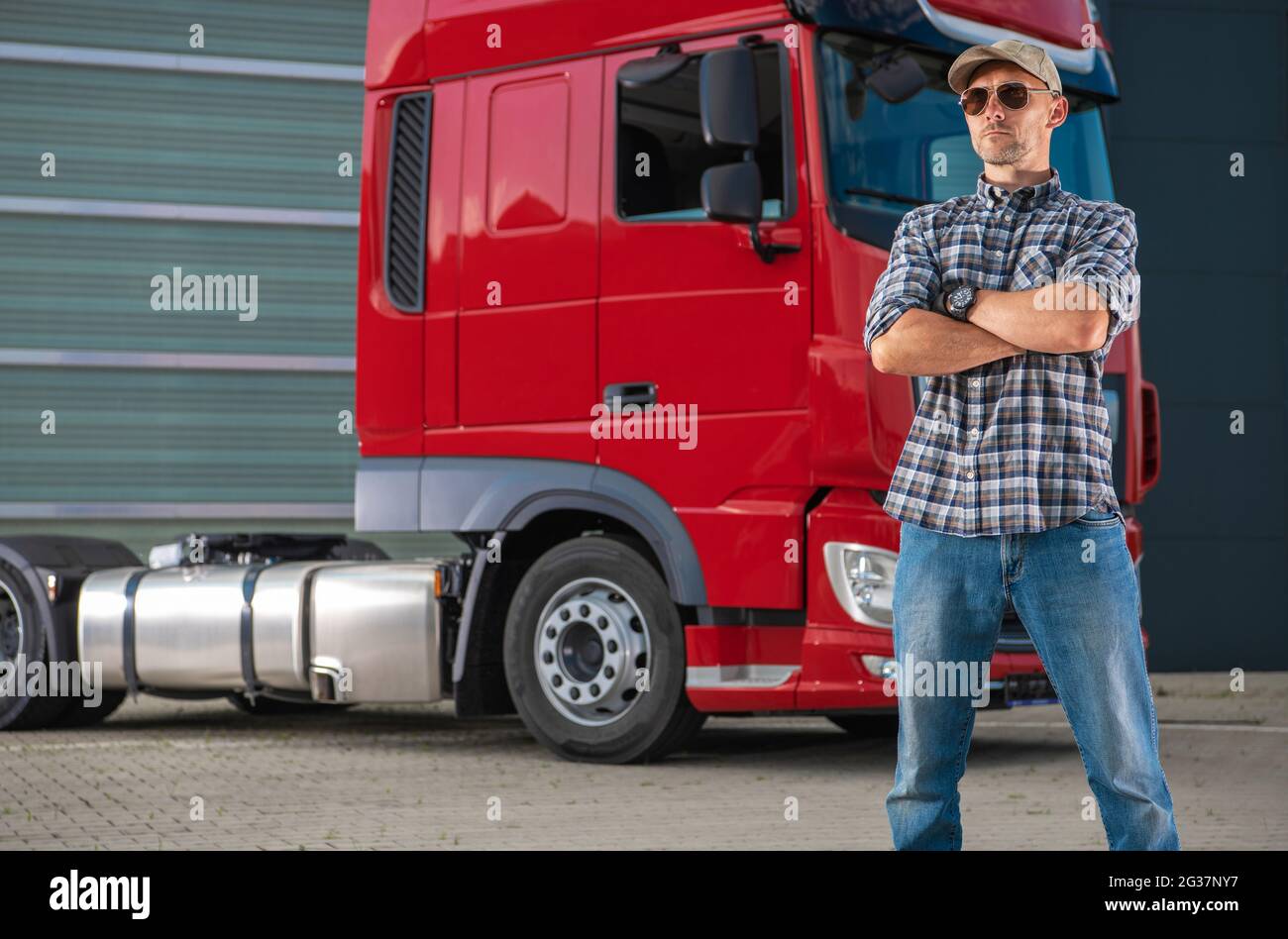 Professional Semi Truck Driver in His 40s and His Heavy Duty Vehicle ...