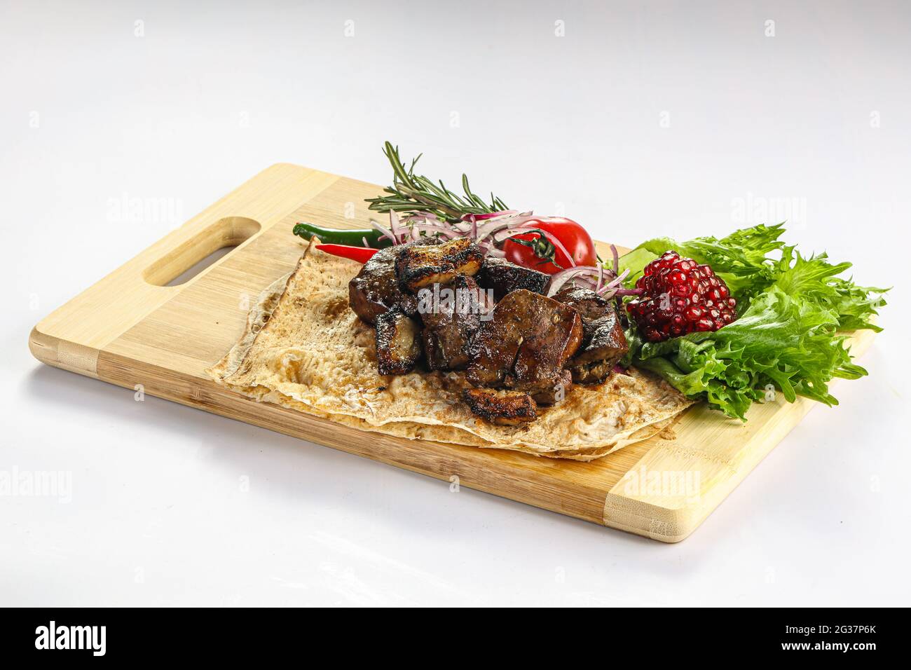 Lamb liver barbeque with fat served salad Stock Photo - Alamy