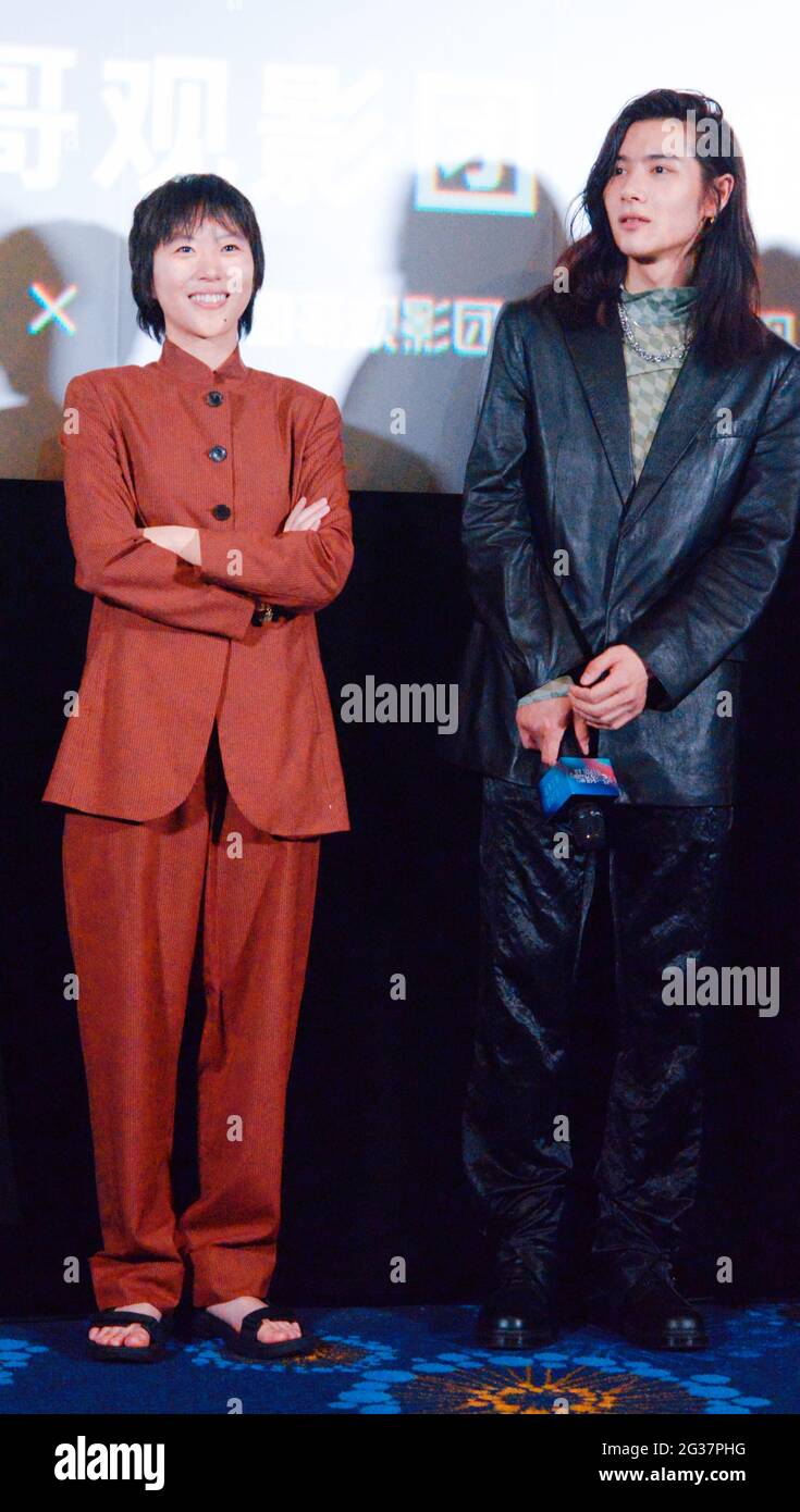 SHANGHAI, CHINA - JUNE 12, 2021 - Actress Leah Dou (L) and actor Giver ...