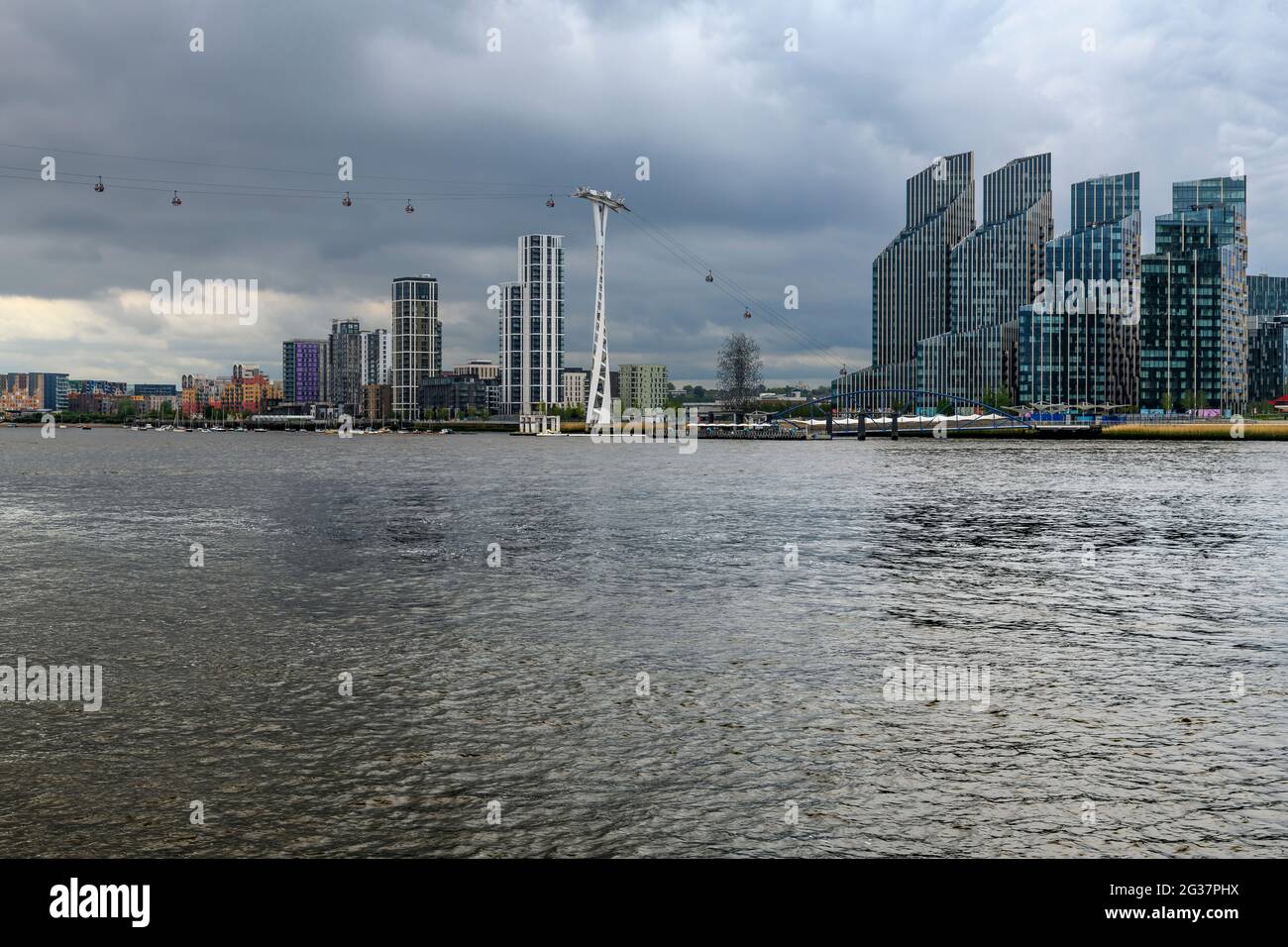 London skyline showing the Emirates Air Line cable car that crosses the ...