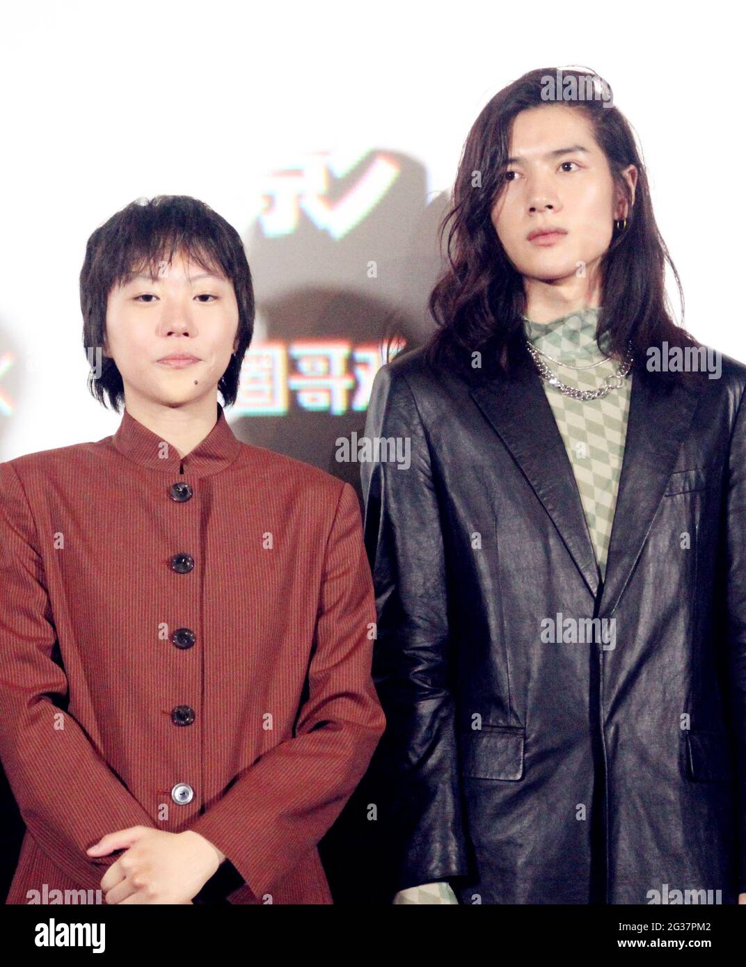 SHANGHAI, CHINA - JUNE 12, 2021 - Actress Leah Dou (L) and actor Giver ...