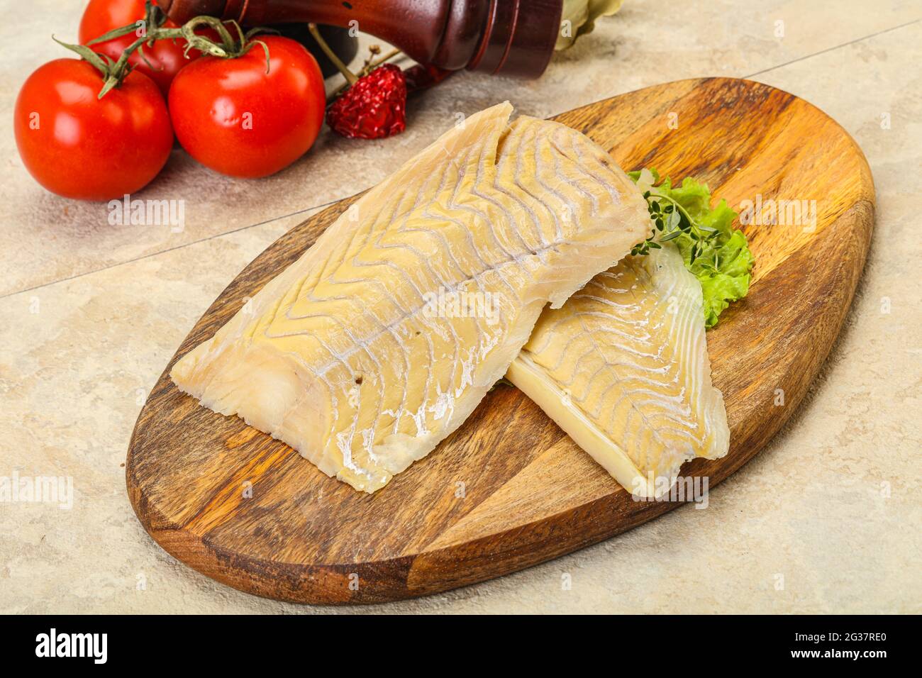 Raw cod fish fillet for cooking Stock Photo - Alamy