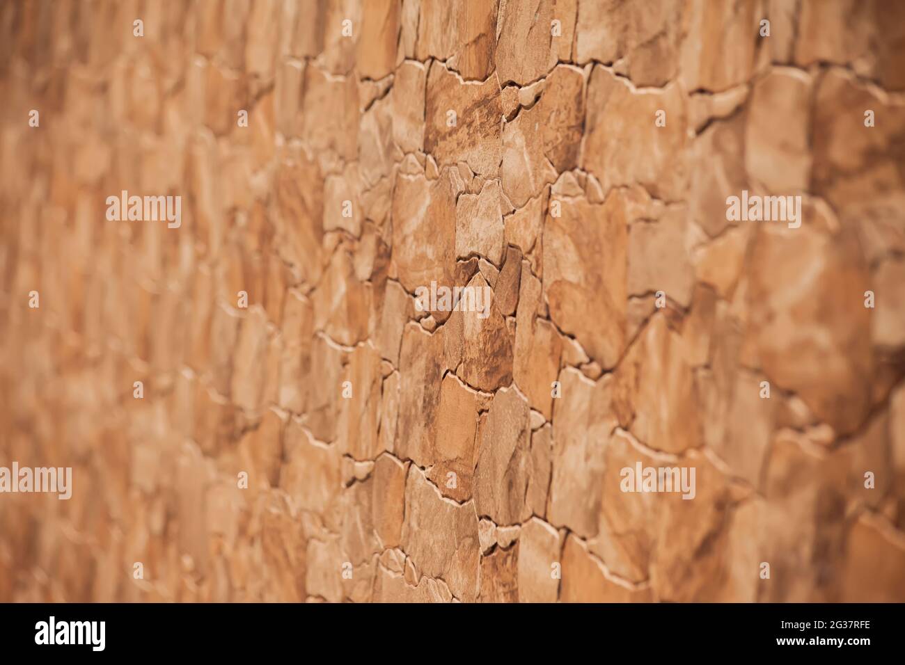 Stone wall surface. Block facade background Stock Photo - Alamy