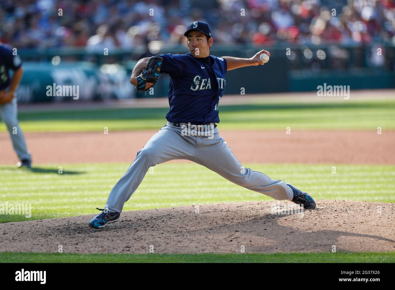 Seattle Mariners pitcher Yusei Kikuchi (18) pitches the ball during an ...